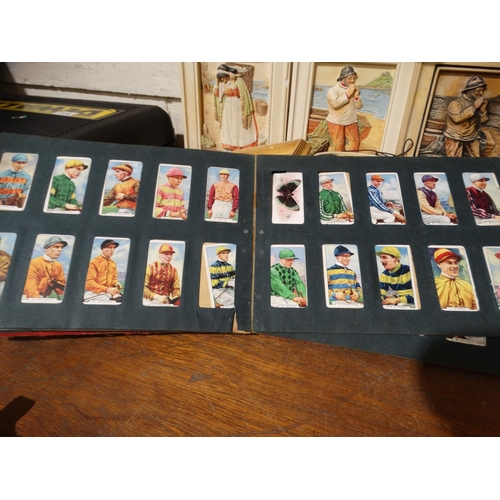 An Album Of Vintage Cigarette Cards