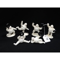 A Group Of Six Cast Iron Michelin Man Figures