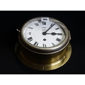 A Brass Cased Ships Wall Clock With Circular Dial, Marked Story, Barrow