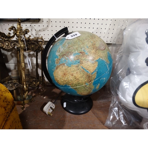 An Illuminated Table Globe