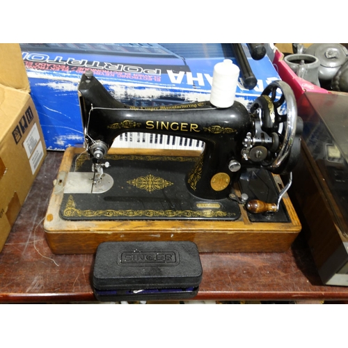 A Cased Singer Sewing Machine
