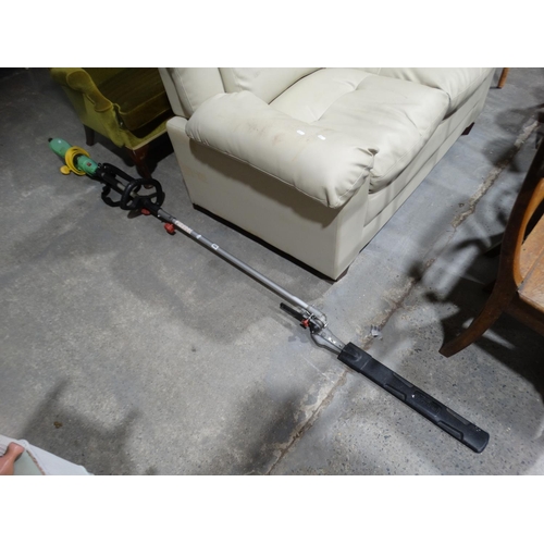 An Electric Long Handle Hedge Trimmer