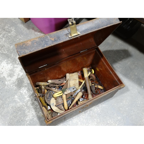 A Vintage Tin Trunk & Contents