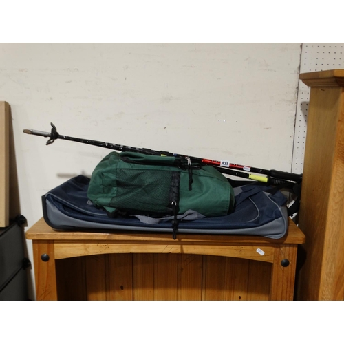 Two Backpacks, Together With Hiking Sticks