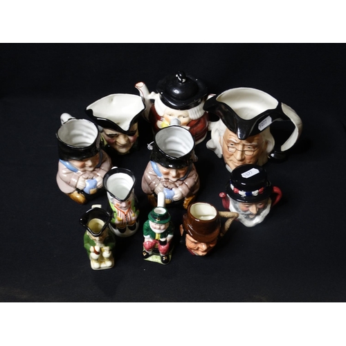 A Collection Of Mixed Toby & Character Jugs