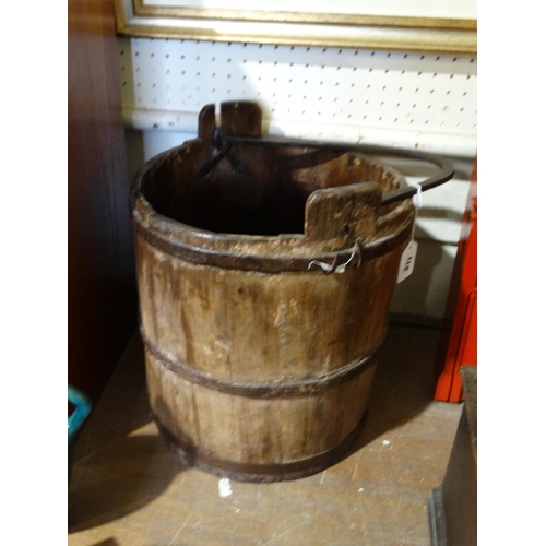 A Vintage Wooden Pail With Iron Bands