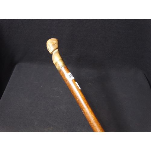 A Carved Tribal Cane