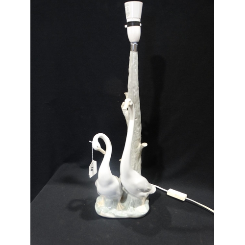 A Nao Porcelain Table Lamp Base In The Form Of Geese