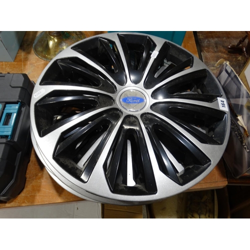 A Set Of Four Ford Hub Caps
