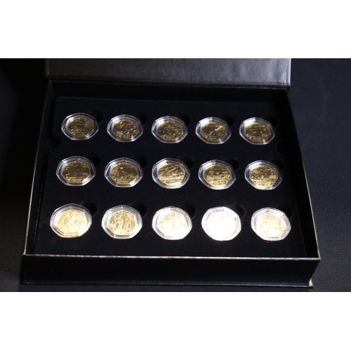 A Fifteen Piece Collectors 50p World War II Commemorative Coin Set