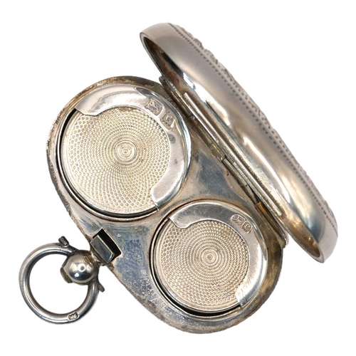 AN EDWARDIAN SILVER DOUBLE SOVEREIGN CASE Oval form with engraved ...