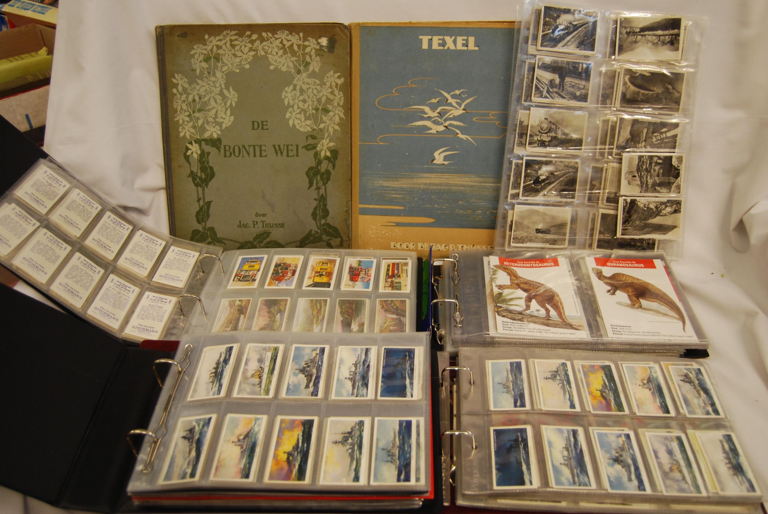 4 CIGARETTE CARD ALBUMS COMPRISING OF MANY SETS AND 2 DUTCH CARD ALBUMS