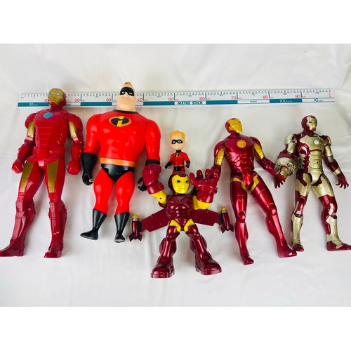 A collection of large action figures including Mr. Incredible