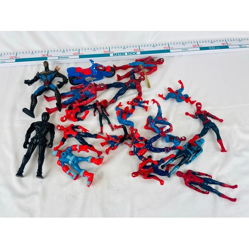 A collection of 22 Spider Man action figures