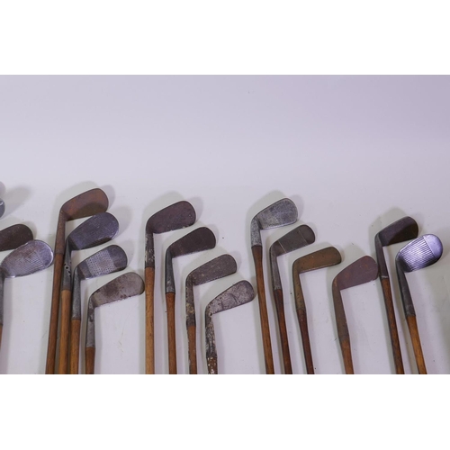 Collection of antique and vintage golf clubs, various makers, A. ?bes ...