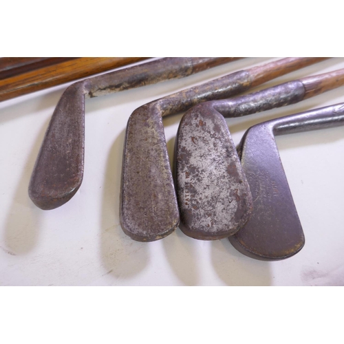 Collection of antique and vintage golf clubs, various makers, A. ?bes ...