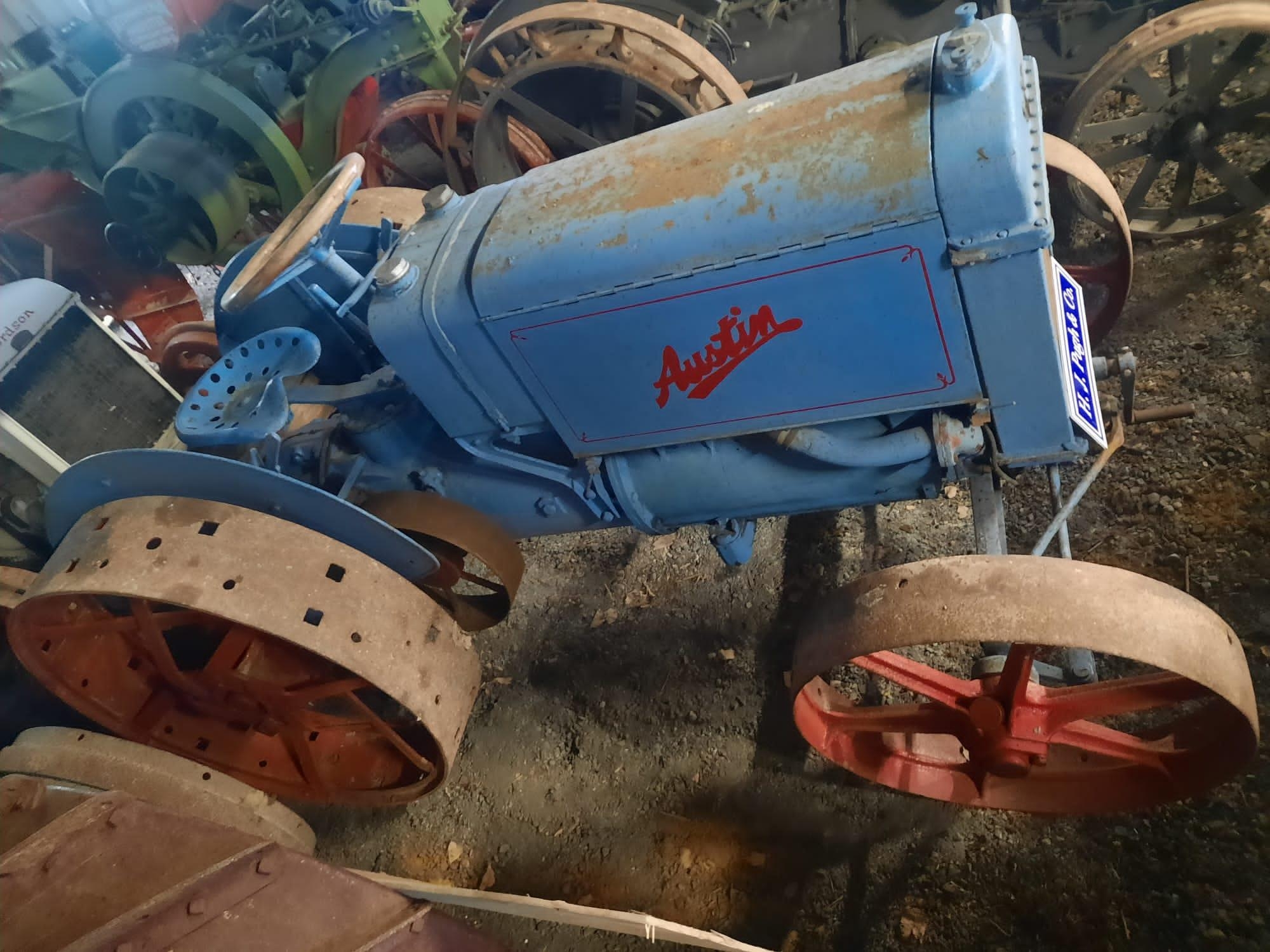 Early Austin tractor, on steel wheels. Engine needs recommissioning