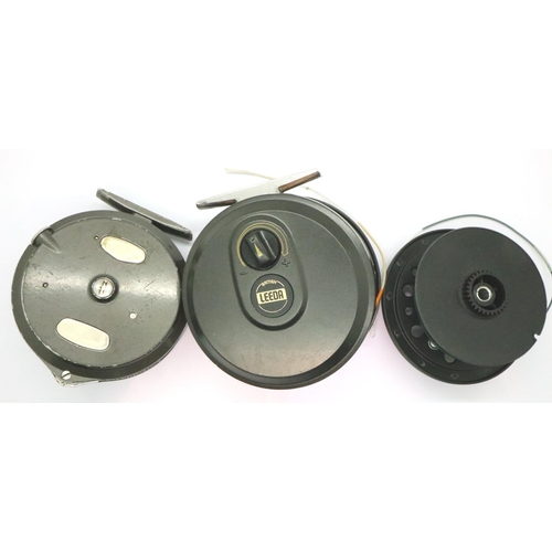Two fly reels Leeda Magnum 2000 disc drag and another, with a spare ...