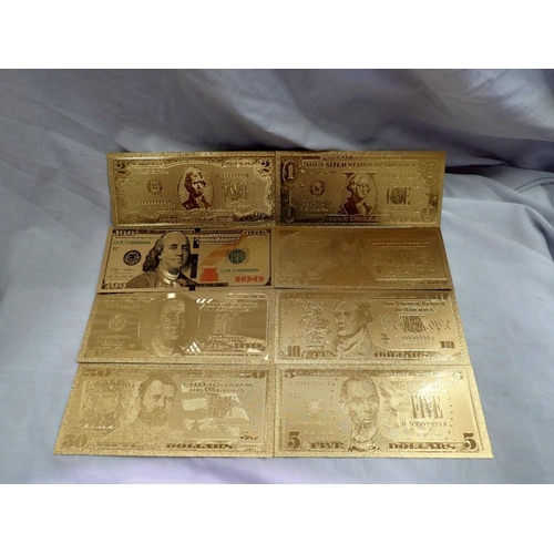 Eight American gold plated novelty bank notes. UK P&P Group 0 (£7+VAT ...