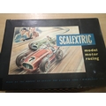 Vintage Scalextric set no. 1, two tinplate cars with roller pickups ...