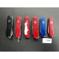 SIX VICTORINOX SWISS ARMY KNIVES of various sizes and designs Note: You ...