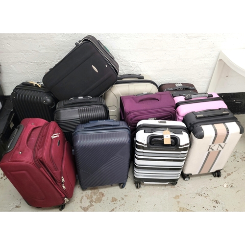 SELECTION OF ELEVEN SUITCASES including: it Luggage, TGS and Manoukian ...