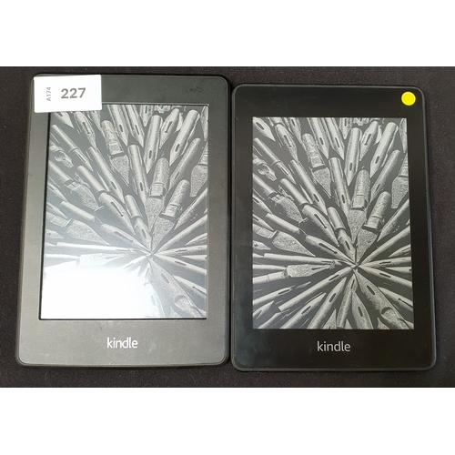 TWO AMAZON KINDLE E-READERS comprising a Paperwhite 4, serial number ...