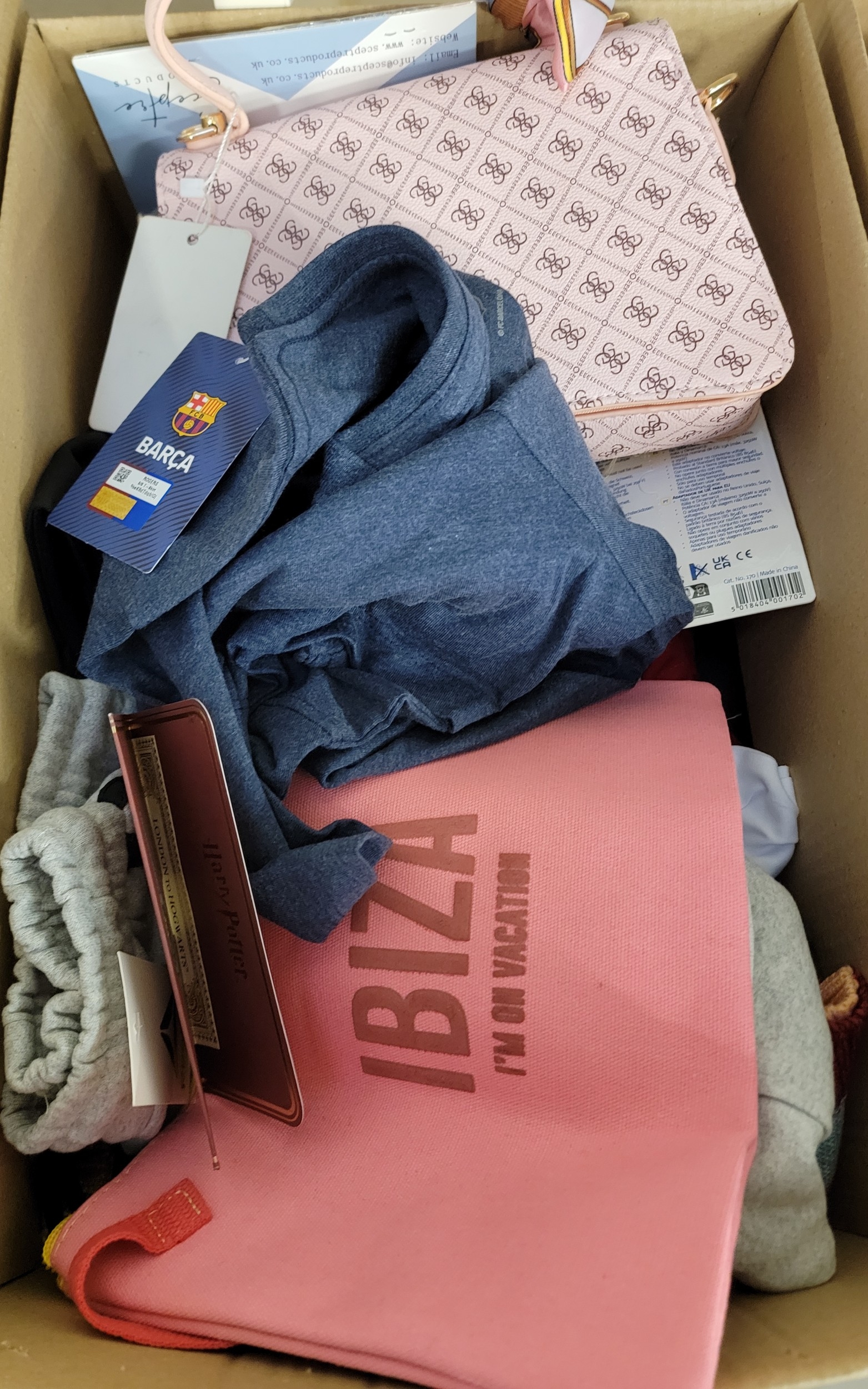 ONE BOX OF NEW ITEMS including: souvenirs and clothing