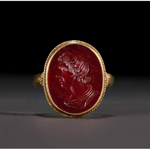 A GREEK FIGURAL AGATE INTAGLIO FINGER RING OF A RULER SET ON GOLD ...