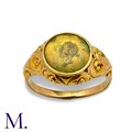 A Duke Of Wellington Signet Ring in yellow gold, with a glass locket ...