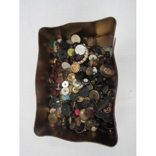 tin of old buttons