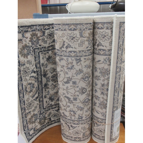 Pair of cream Patterned Rugs 80x 180cms