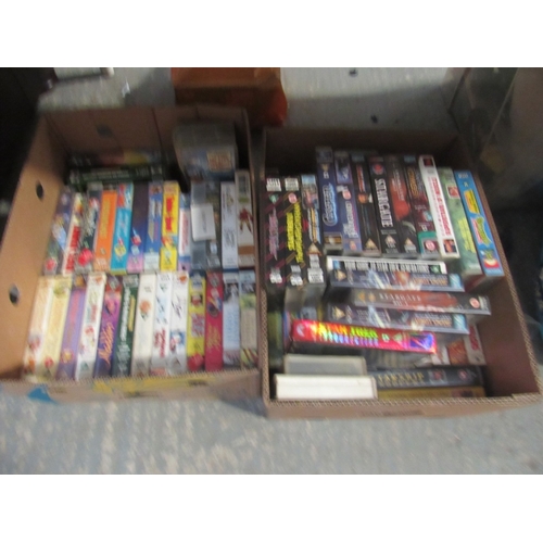 2 Boxes of video tapes