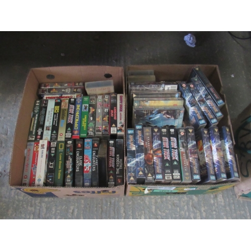 2 Boxes of video tapes