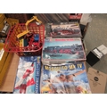 Box of model cars and model kits