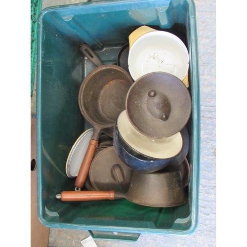 Box of cast iron pans