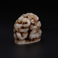 A pale celadon jade 'deer and lingzhi' hat finial, Qing Dynastydeeply ...