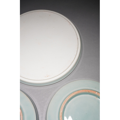 A group of three Chinese blue and white everted rim dish, one painted ...