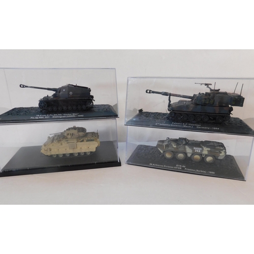 Four boxed tank models