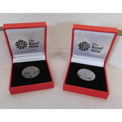 Two Queen Elizabeth Diamond Jubilee Commemorative coins - boxed