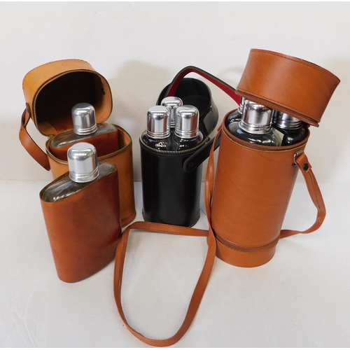 Three vintage flasks