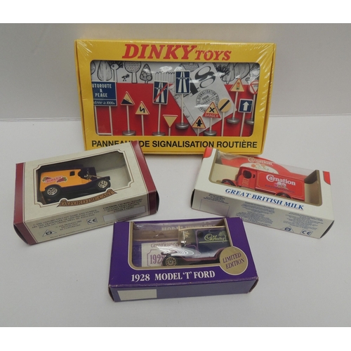 Three boxed vehicles and Dinky sign posts