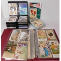 Two postcard albums and two reference books - vintage and antique