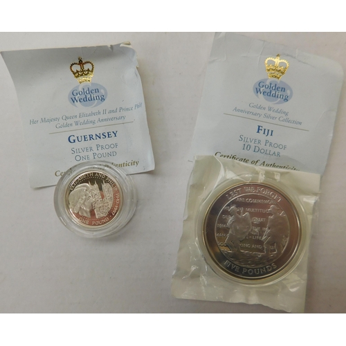 Two silver proof coins with paperwork