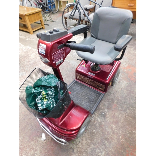Shoprider mobility scooter and charger W/O - key in office