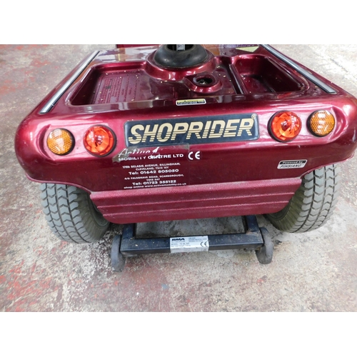 Shoprider mobility scooter and charger W/O - key in office