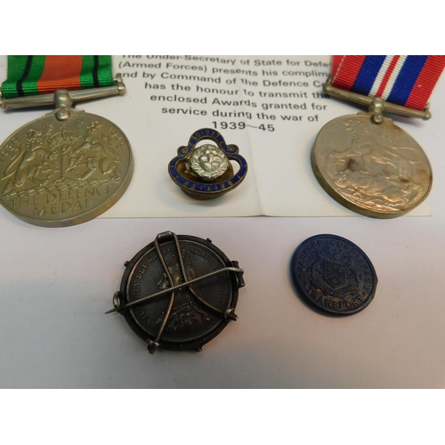 WWII medals and pin badges
