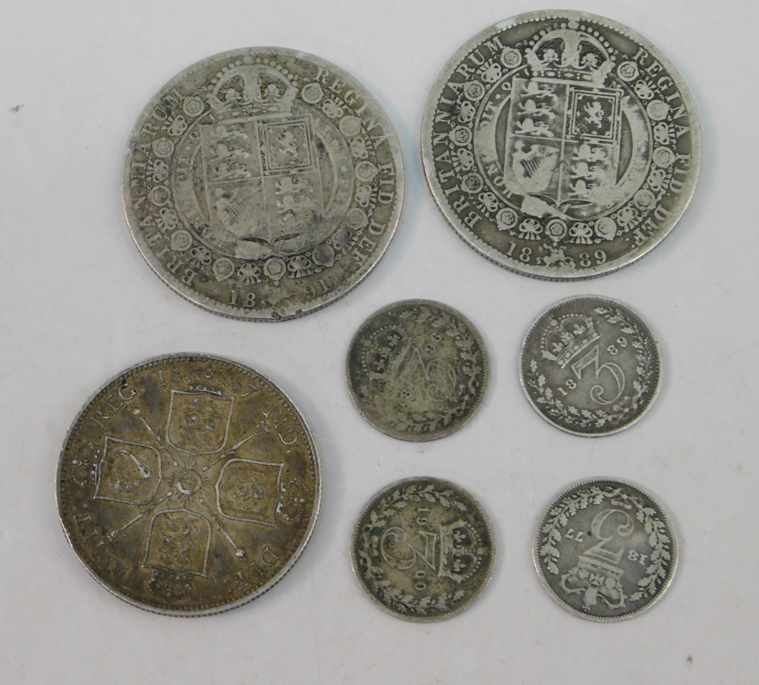 Seven Victorian silver coins - combined weight 43.6g