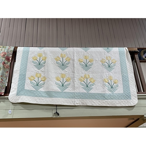 Durham quilt with applique tulip design 2.21 by 1.84.