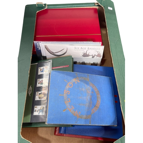 Eight stamp albums, presentation packs, etc.